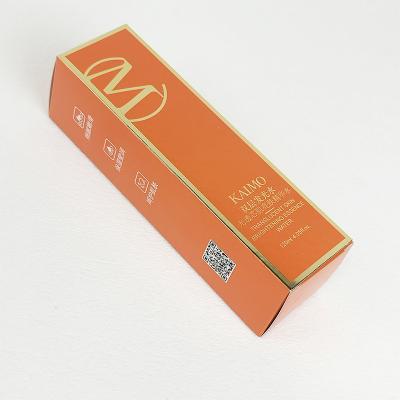 China Small Orange Cosmetic Storage Kit Skin Care Gift Packing Box With Metallic Silver Paper for sale