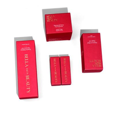 China Custom Skin Care Packaging Red Cosmetic Box Set for sale