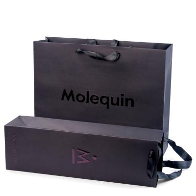 China Custom Black Paper Shopping Bags With Ribbon Handles  Stylish Product Packaging Box Design for sale