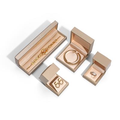 China Champagne Gold Luxury Jewelry Box with Custom Logo and Recycled Materials for Elegant Gift Packaging for sale
