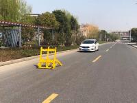 China Low Speed Road 25KG Mobile Vehicle Barrier With Rubber Wheels for sale