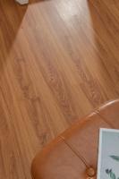 China Stain-resistant and Waterproof Brown 1220x180mm Interior Floor SPC Flooring UV Coating Thickness 5mm Wooden Pattern For Building and Project for sale