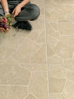 China Grade AAA Decorative Elegant Waterproof Stain-resistant Cream Yellow Stone Style 598x598mm Thickness 12mm Outside Floor And Wall Ceramic Tiles For Renovation And Project for sale