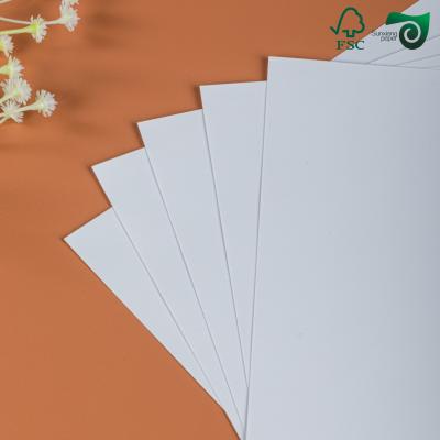 China 226μM Self Adhesive Sticker Paper White Glossy Waterproof Polypropylene Synthetic Paper for sale