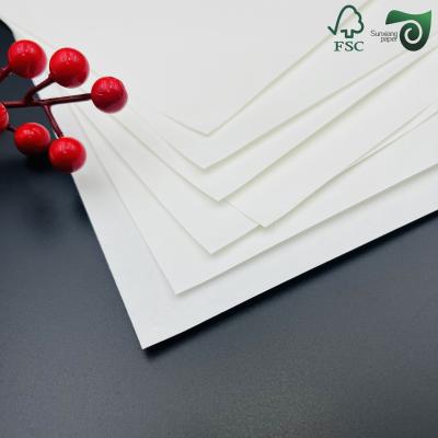 China FSC 70g 80g Degradable Food Safe Grease Resistant Paper Ideal For Fried Food Packaging for sale