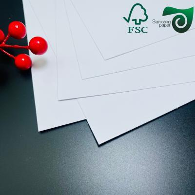 China FSC 300gsm Double Side Coated Cardboard For Game Cards  70cm 100cm C2S Art Board for sale