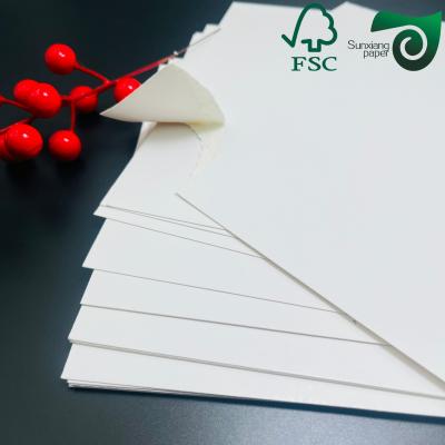 China FSC 300gsm 250gsm Natural White FBB SBS Folding Box Board 70cm 100cm for sale