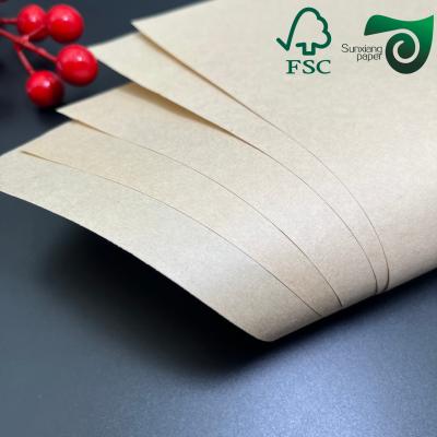 China FSC 35gsm 40gsm White Bleached MG Kraft Paper Food Packaging Grade 50cm 70cm for sale