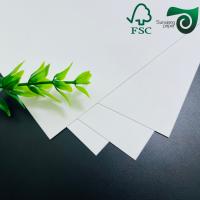 China 325gsm FSC Uniform White Coated Kraft Back Paper 70cm 100cm Perfect For Bread Packaging for sale