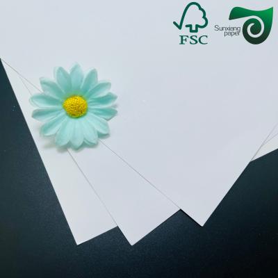 China FSC 280gsm 310gsm 330gsm  C2S Double Glossy Art Paper Blue Black Core for sale