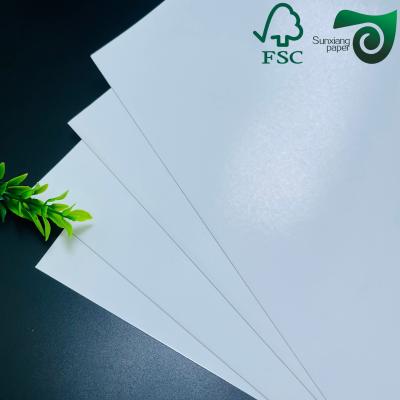 China FSC 115g 130g C2S Glossy Art Paper  Excellent Printability For Photobooks 72cm 102cm for sale