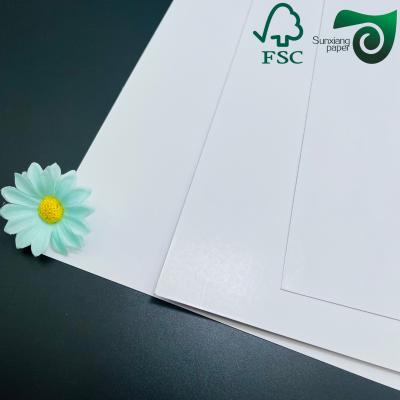 China FSC 58gsm 60gsm LWC Paper Light Weight Coated White Paper Double Sides Gloss for sale