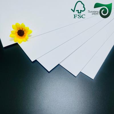China FSC 100grs 128grs 157grs White Coated Cardboard Brilliant Coated Face C2S Couche Paper for sale