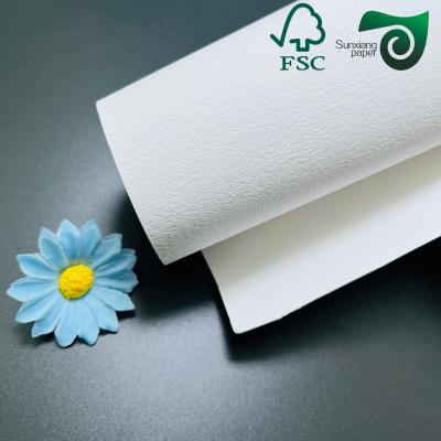 China FSC 230GSM Cloth Texture Embossed Paper Premium Specialty White Cardstock For Luxury Gift Boxes for sale