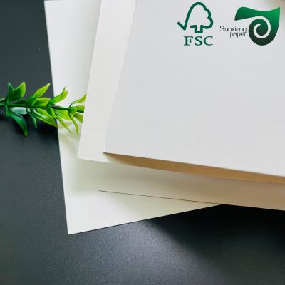 China FSC Good Printing Stability 215gsm SBS White Cardboard For Cosmetics Box for sale