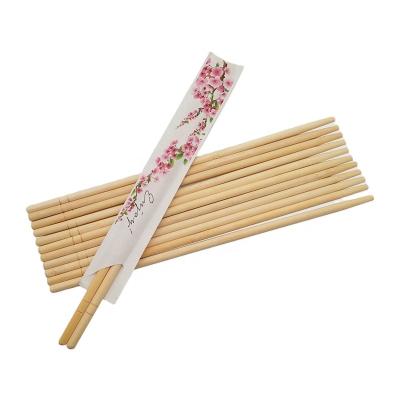 China Disposable Bamboo Chopsticks with Paper Sleeve Pack Round Shape and Small Flower Printed for sale