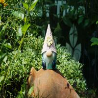 China Metal Garden Gnome Ornaments Outdoor Decor Small Flower Gnome for sale