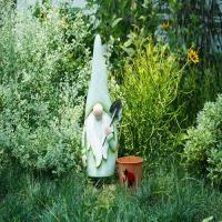 China Metal Garden Ornaments Spring Brights Gnome Garden Statuary With Planter for sale
