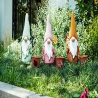 China Metal Garden Ornaments Spring Brights Gnome Garden Statuary With Planter for sale
