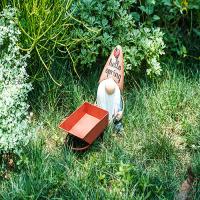 China Recycled Small Metal Garden Ornaments Gnome Pushing The Cart With Planter for sale