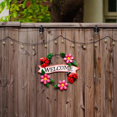 China Custom Metal Resin Wall Hanging Ornaments - Modern Home Decor with Welcome Slogan, 100pcs Minimum Order for sale