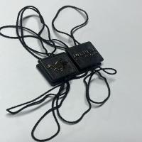 China Garment Swing Price Tag Fasteners Black Hanging Tags Strings OEM for sale