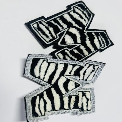 China Standard Or Custom Hole Size Garment Patches With Full Color Printing For Customized Designs And Personalized Styles for sale