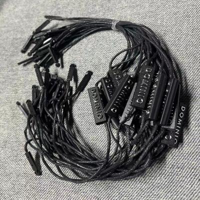 China Plain Black Hang Tag String 7 Inches Cotton Durable Cotton Fabric Ideal for Clothing Tags and Product Identification for sale