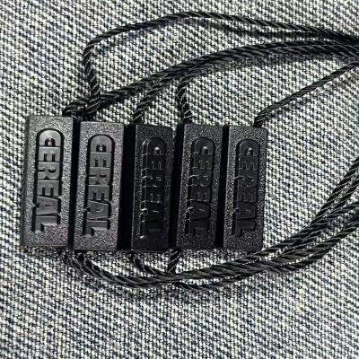 China Black Flexible Garment Swing Tags Customizable Durable Apparel Labels Perfect for Clothing Industry Enhancing Visibility for sale