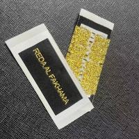 China Ultrasonic Cut With End Fold Woven Clothing Labels Customized Soft Fabric Tags Ideal for Clothing Branding and Textile for sale