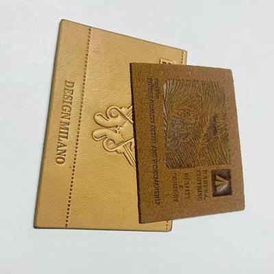 China Durable Jeans Leather Label Sew On Closure Type Suitable for Jackets Providing Strength and Fashionable Look in Clothing for sale