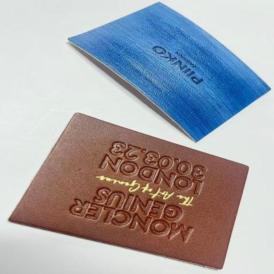 China Customization Custom Leather Labels Sew On Closure Type Perfect for Clothing Accessories Bags and Handmade Leather Goods for sale