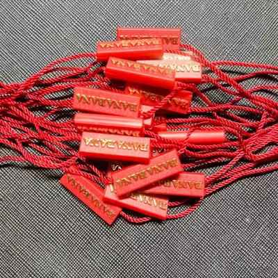China Wipe With A Soft Cloth Plastic Tag Fastener Unique And Eye-catching Diameter 0.2 Inches Ideal For Retail Tags And Labels for sale
