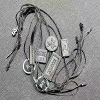 China Flexible Garment Swing Tags Black Suitable for Clothing Labels Apparel Identification and Textile Product Customization for sale