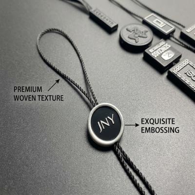 China Flexible Garment Swing Tags Black Suitable for Clothing Labels Apparel Identification and Textile Product Customization for sale