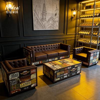 China Industrial Retro Chesterfield 3 Seater Sofa Vintage License Plate Print Brown Leather Couch for Bar & Man Cave for sale