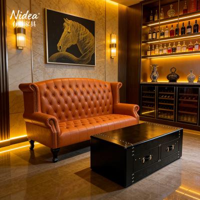 China Luxury Vibrant Orange Leather Chesterfield Wingback 3 Seater Sofa All-over Tufted Sponge-Filled Set for Modern Boutique Hotel for sale
