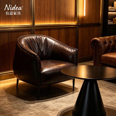China Modern Italian Luxury Handmade Genuine Leather Ergonomic Barrel Chair with Metal Legs Single Accent Armchair for Living Room for sale
