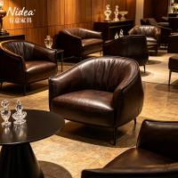 China Modern Italian Luxury Handmade Genuine Leather Ergonomic Barrel Chair with Metal Legs Single Accent Armchair for Living Room for sale