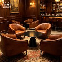 China Modern Italian Luxury Handmade Genuine Leather Ergonomic Barrel Chair with Metal Legs Single Accent Armchair for Living Room for sale