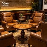 China Classic Vintage Handmade Genuine Leather Wingback Chair Single Seater Armchair Rolled Arms Nailhead Trim for Living Room Villa for sale