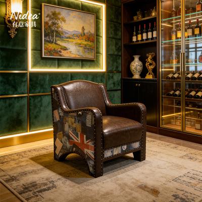 China Designer Genuine Leather Union Jack Patchwork Armchair Luxury Vintage Accent Chair with British Flag Pattern for Club Bar Hall for sale