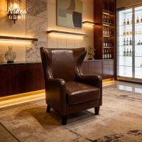 China Luxury Modern Country Wingback Leather Chair with Patterned Back for Boutique Hotel and Club Bar for sale