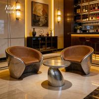 China Luxury Industrial for Semicircle Chair Hand-riveted Aluminum Shell Leather Accent Armchair Modern Bucket Seat Durable Hotel for sale