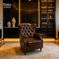 China Handcrafted Genuine Leather Wing Chair Brass Casters Vintage Deep Tufted Antique British Design Living Room Club Chair for Bar for sale