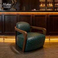 China Modern Luxury Emerald Green Leather Ergonomic Accent Chair Diamond Quilted Design Wrap-around Solid Wood Frame for Living Room for sale
