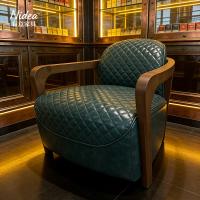 China Modern Luxury Emerald Green Leather Ergonomic Accent Chair Diamond Quilted Design Wrap-around Solid Wood Frame for Living Room for sale