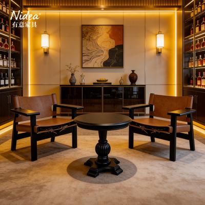 China Modern Luxury Spanish Style Handmade Lounge Chair Premium Saddle Leather Accent Armchair Wide Armrests Buckle Home Furniture Bar for sale
