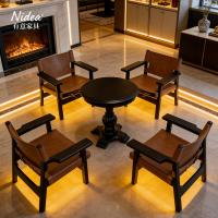 China Modern Luxury Spanish Style Handmade Lounge Chair Premium Saddle Leather Accent Armchair Wide Armrests Buckle Home Furniture Bar for sale