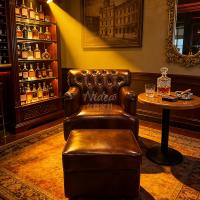 China Luxury Vintage Brown Leather Chesterfield Armchair Ottoman Set Classic Tufted Ergonomic Club Chair for Living Room Home Office for sale